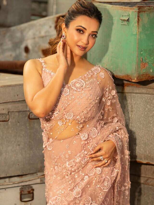 Koushani Mukherjee looks stunning in peach saris